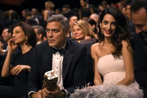 George Clooney, his wife Amal and children become French | News | kten.com