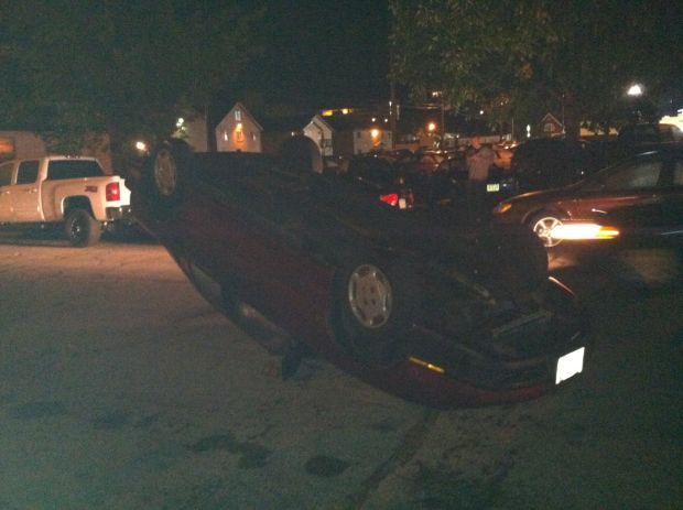 Hooligans overturn cars near campus during fest's opening weekend