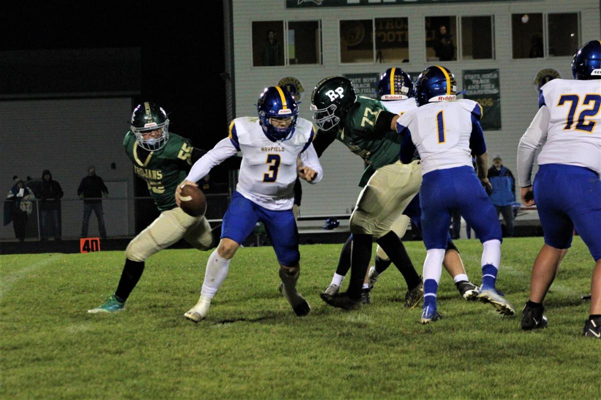 High school football: Trojans defense shines with eight turnovers