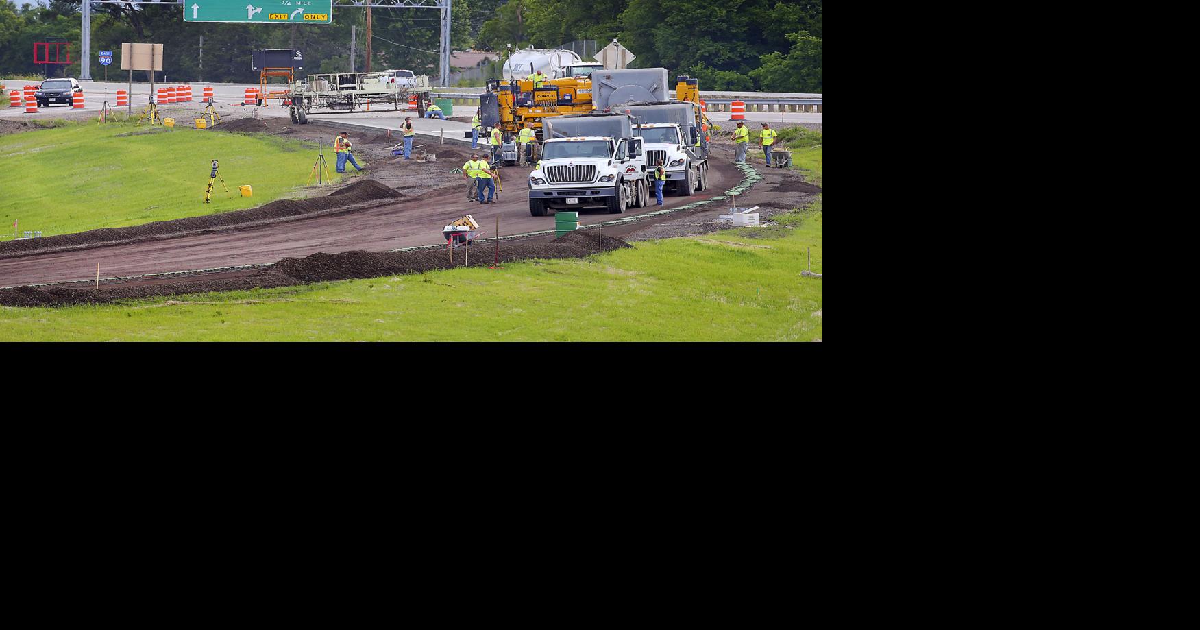 Crew installing concrete pavement on Exit 3 ramp