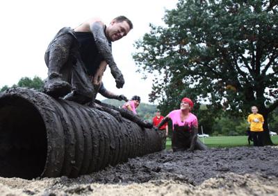 Runners get muddy for Children’s Museum of La Crosse