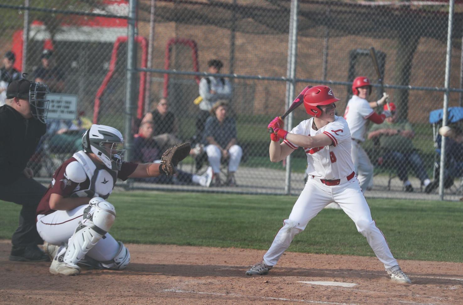 Scenes from Holmen at Logan baseball, Tomah at Aquinas soccer