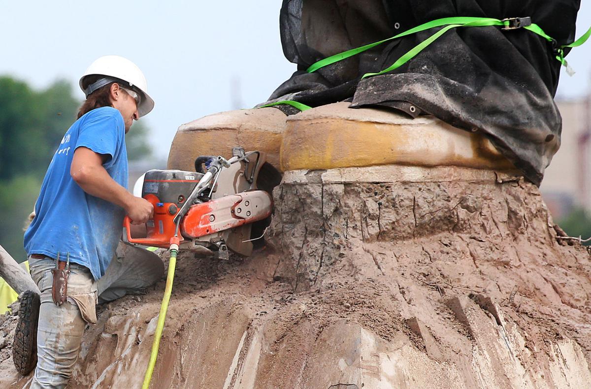 Crews begin removing controversial Hiawatha statue from Riverside Park ...