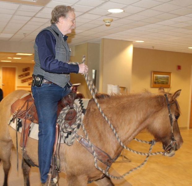 Dr. Menn rides through hospital, into the sunset