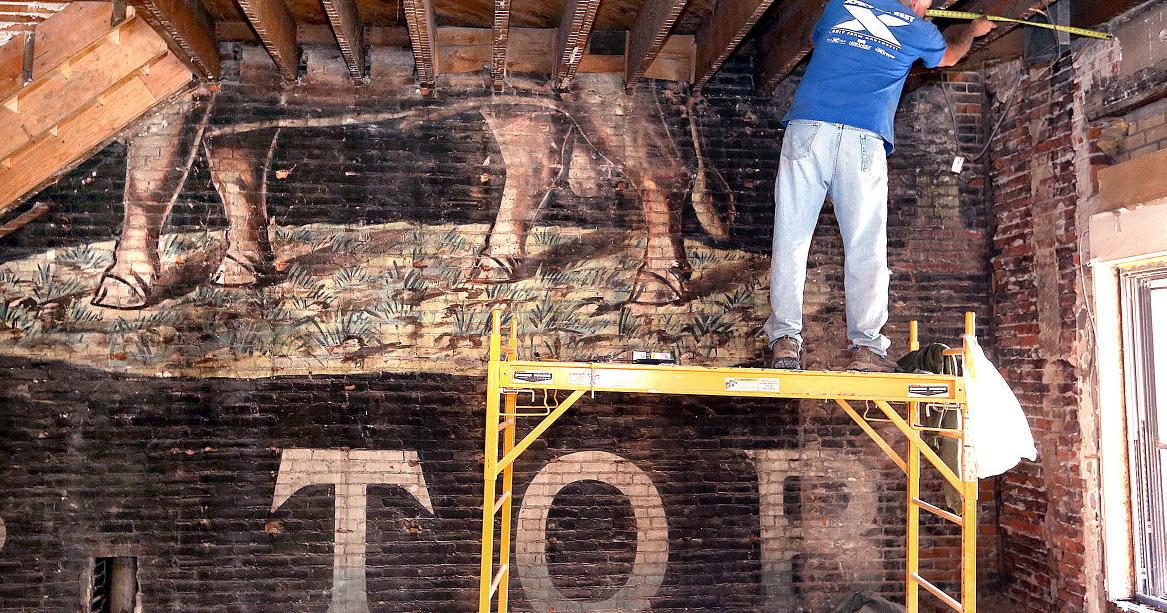 Downtown renovation unveils 19th century Bull Durham ad