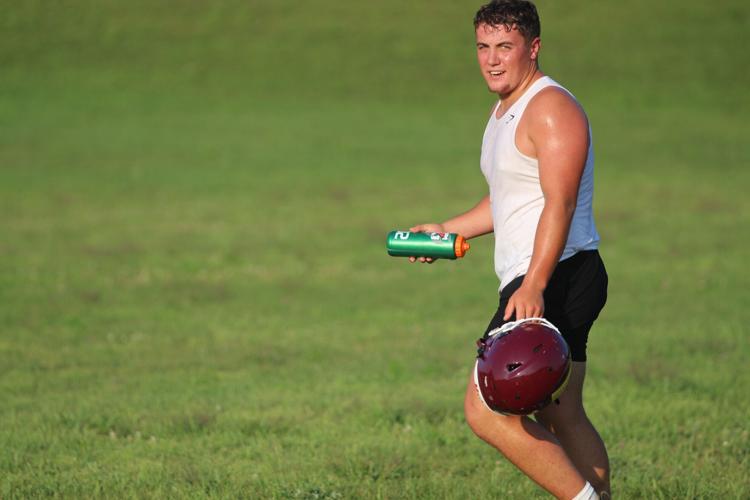 High school football: Adam Schmitt to anchor big Holmen offensive line