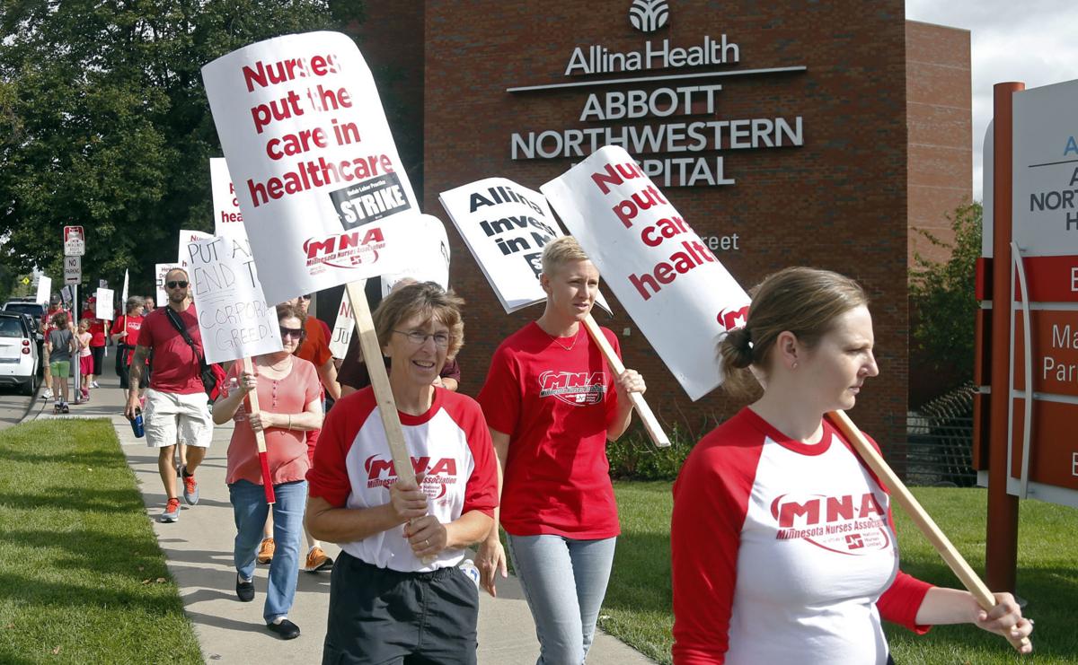 Nurses hit picket lines in strike at five Minnesota hospitals