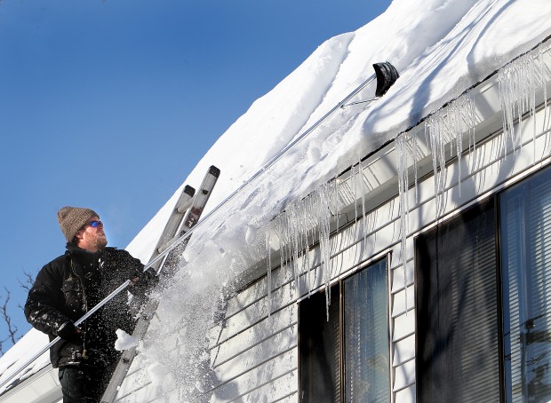 Snow-laden rooftops worry homeowners