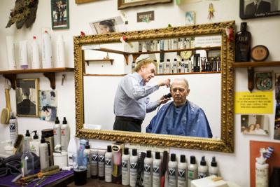 The barber in the Concourse basement