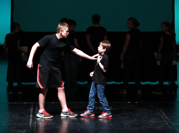 Longfellow kids perform anti-bullying skits for visiting educators
