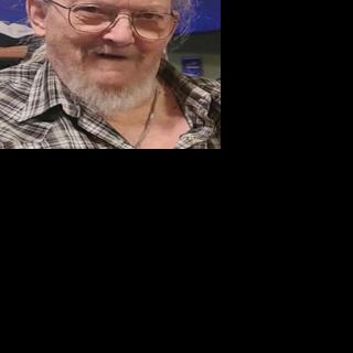 Larry "Top Hat" David Caliguire