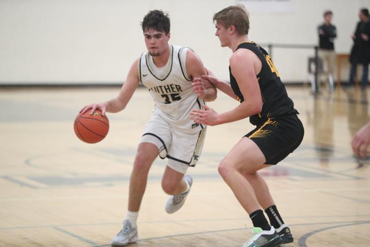 High school boys basketball: Onalaska Luther wins season debut