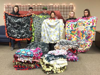 Holmen students bring a little holiday cheer to Ronald McDonald House
