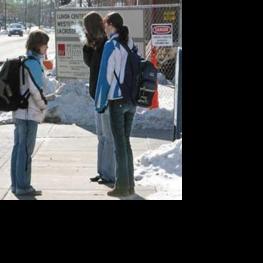 SMOKING ON CAMPUS: Three students at WTC take a smoke break on the ...
