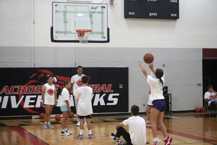 Another local alum joins Davis Brothers basketball camp