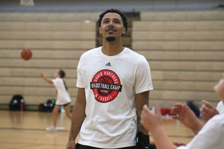 Another local alum joins Davis Brothers basketball camp