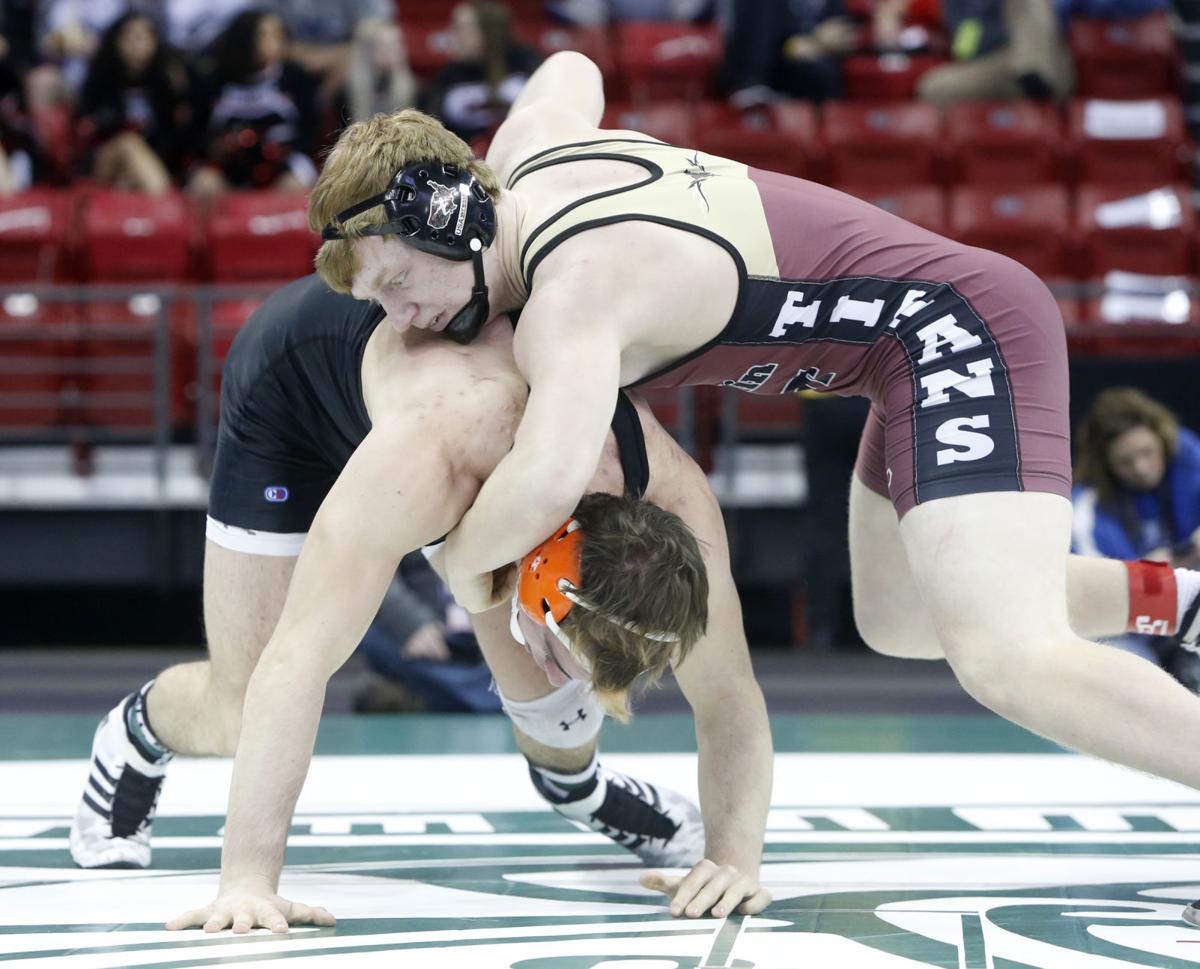 High school wrestling: Titans prepare for first team state semifinal ...