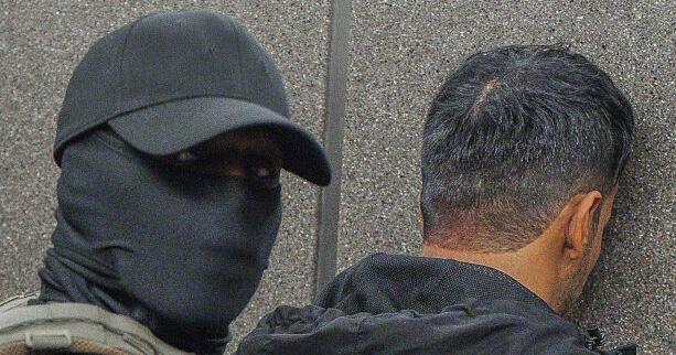 Face coverings at protests become a constitutional matter