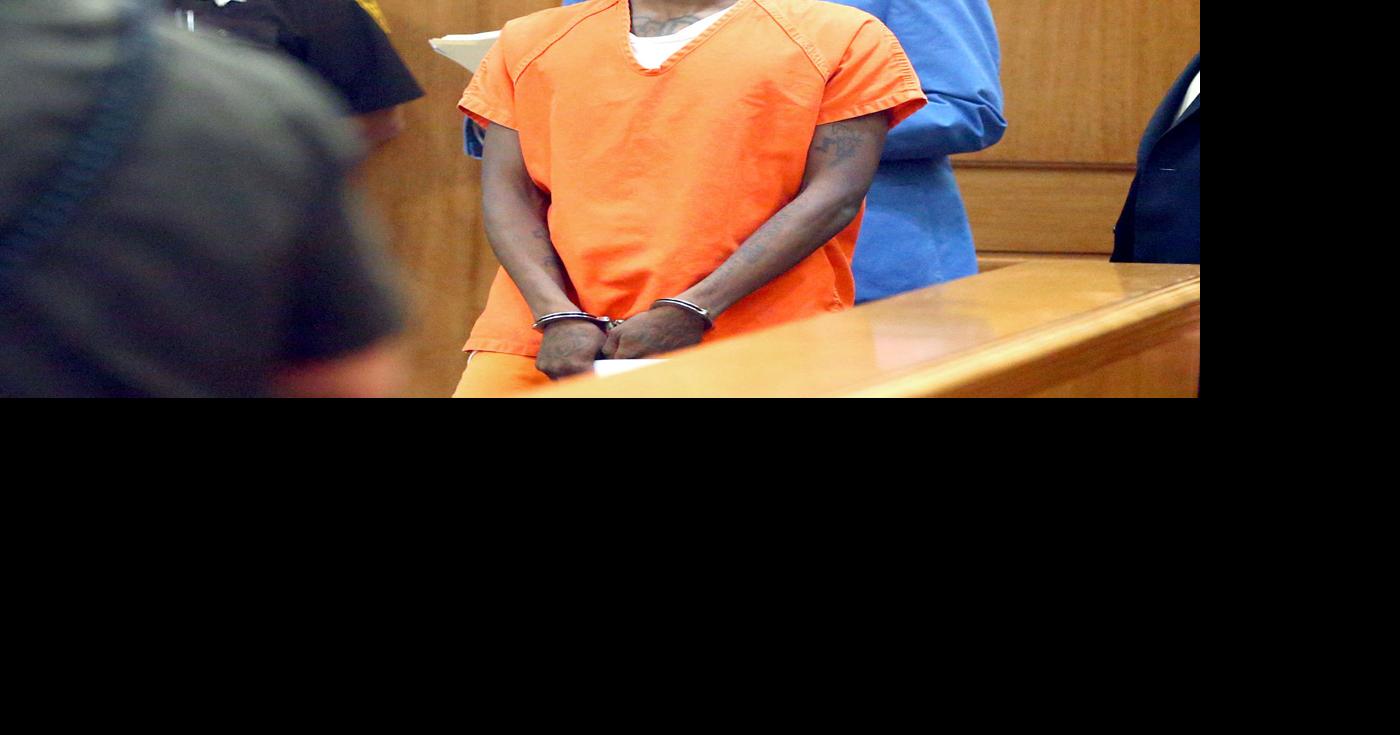 Randall charged with homicide; gun, bloody jacket found