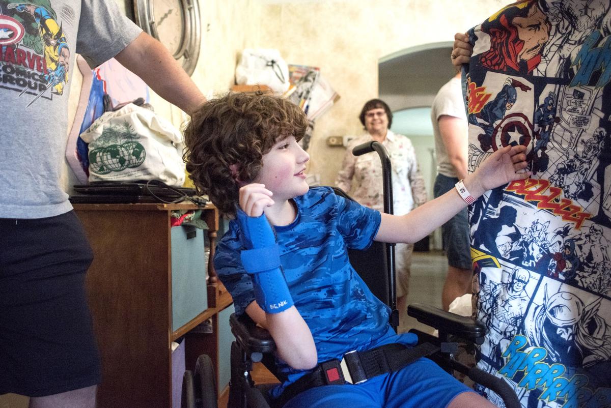 Janesville boy fights back from nearly complete paralysis