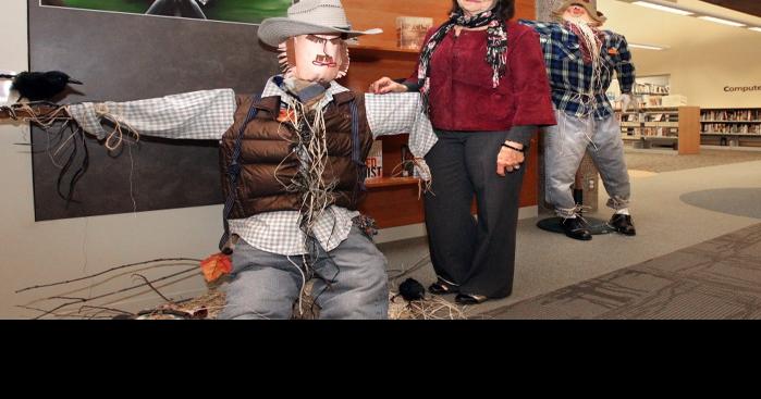 Onalaska library crawling with scarecrows
