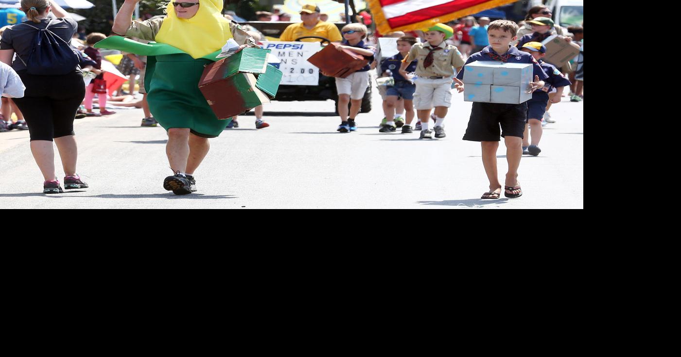Heat can't slow Holmen Kornfest parade