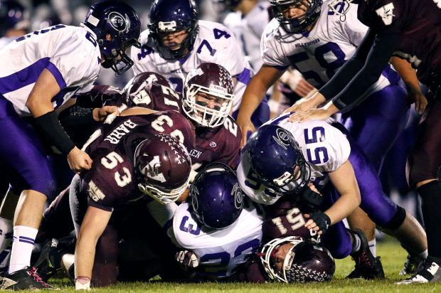 Vikings use turnovers, onside kicks to down Hilltoppers