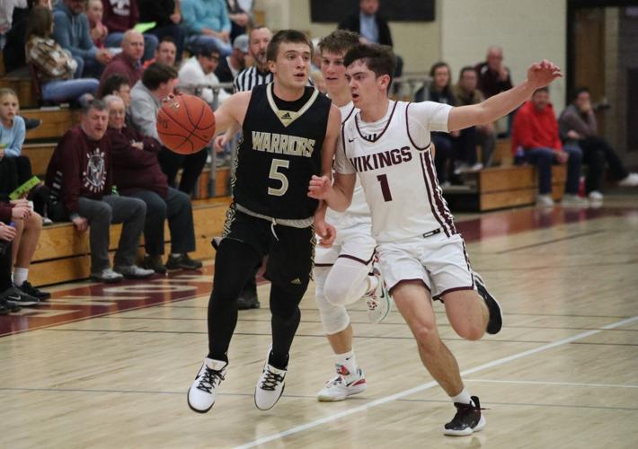 High school boys basketball: Caledonia overcomes rough start against Holmen