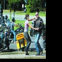 STOPPING FOR A DANCE: Caron Zora-Hertzog and Robb Hertzog dance Tuesday ...