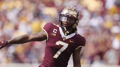 After wiping away tears, Gophers receiver Chris Autman-Bell found his ...