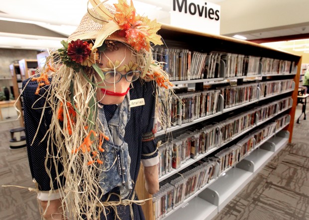 Onalaska library crawling with scarecrows