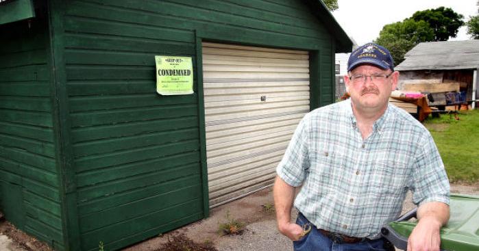 Razing hell at City Hall: North Side homeowner protests city tear-down