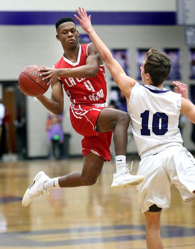High school boys basketball: Tyrell Stuttley leads Onalaska over La ...