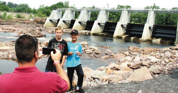 New Black River Falls dam producing power