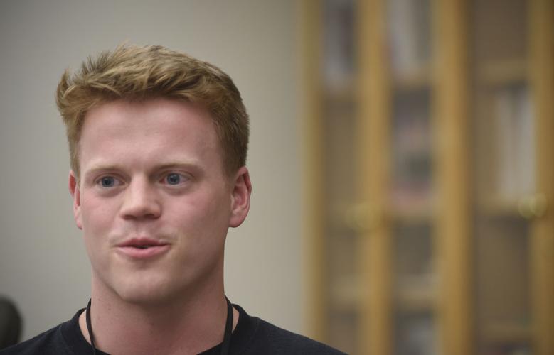 St. John's football players mentor kids at shelter