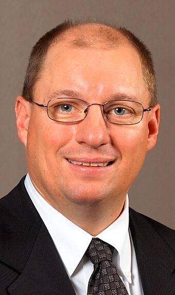 Wanek family tables talks to sell Ashley Furniture