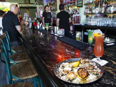 Po’ Boys and a Grand Piano: Chinatown’s New Orleans booze parlor hosts ...