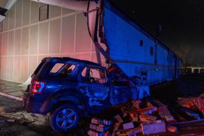 MFRD investigating incident after vehicle on fire crashes into building ...