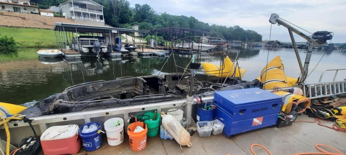 PHOTOS: Blackened Boat Towed From Dock Where It Burned On Lake Of The ...