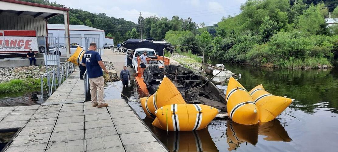 PHOTOS: Blackened Boat Towed From Dock Where It Burned On Lake Of The ...