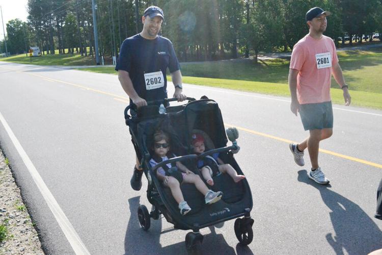 Q.W.A.C. founder oversees record turnout for Lake Gaston run | News ...