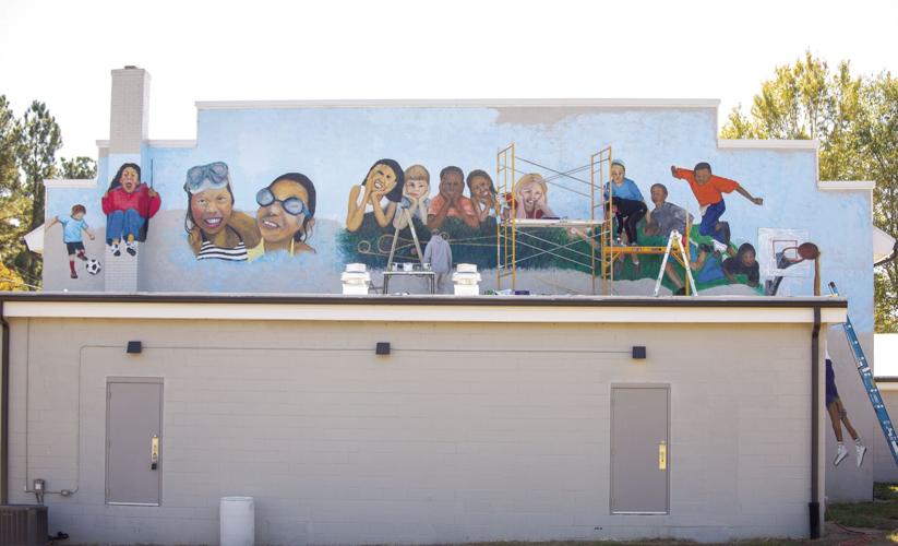 Littleton Academy celebrates new mural on school gymnasium building ...