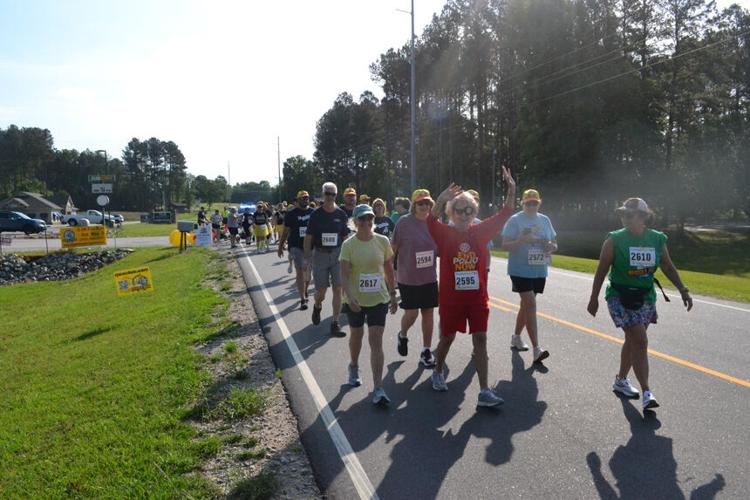 Q.W.A.C. founder oversees record turnout for Lake Gaston run | News ...