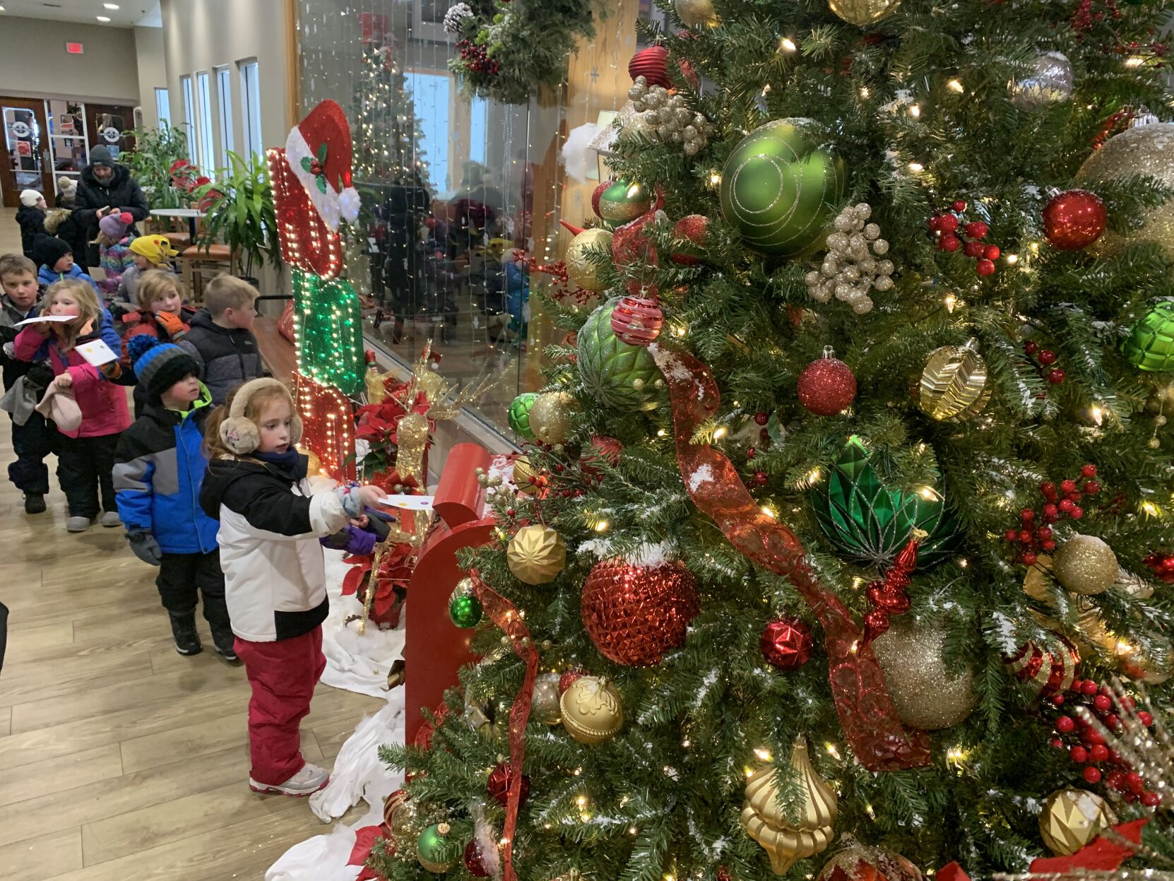 Central-Denison Elementary School students drop off letters to Santa