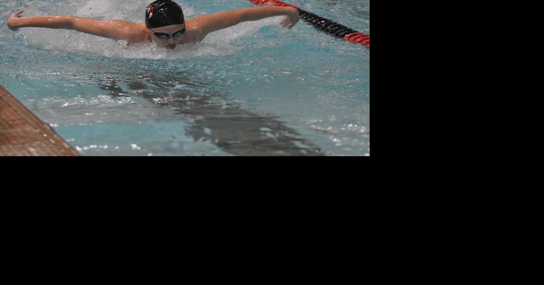 Badger boys swim team swims away with huge victory over Burlington