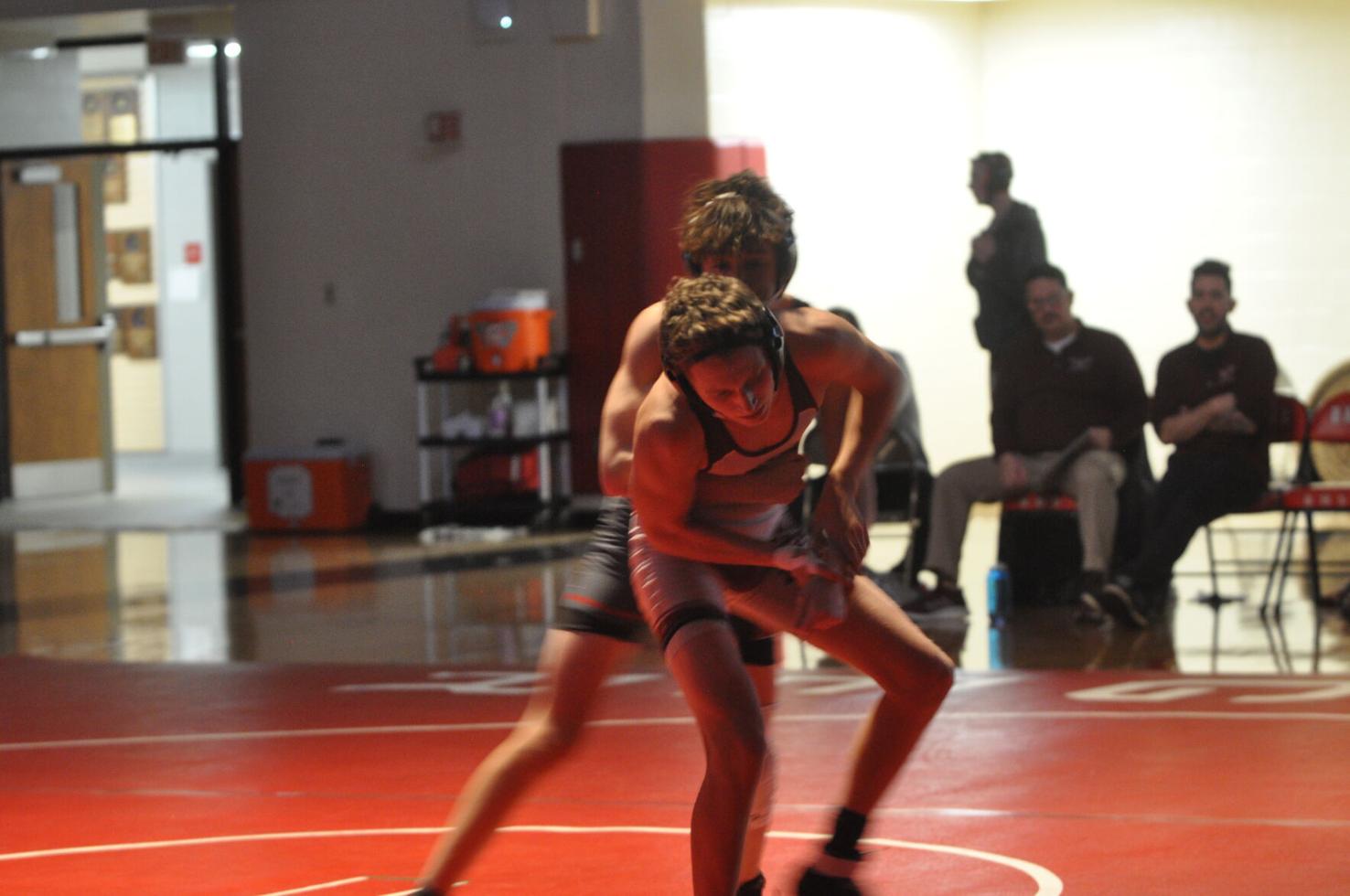 Badger wrestling, Big Foot advance to state