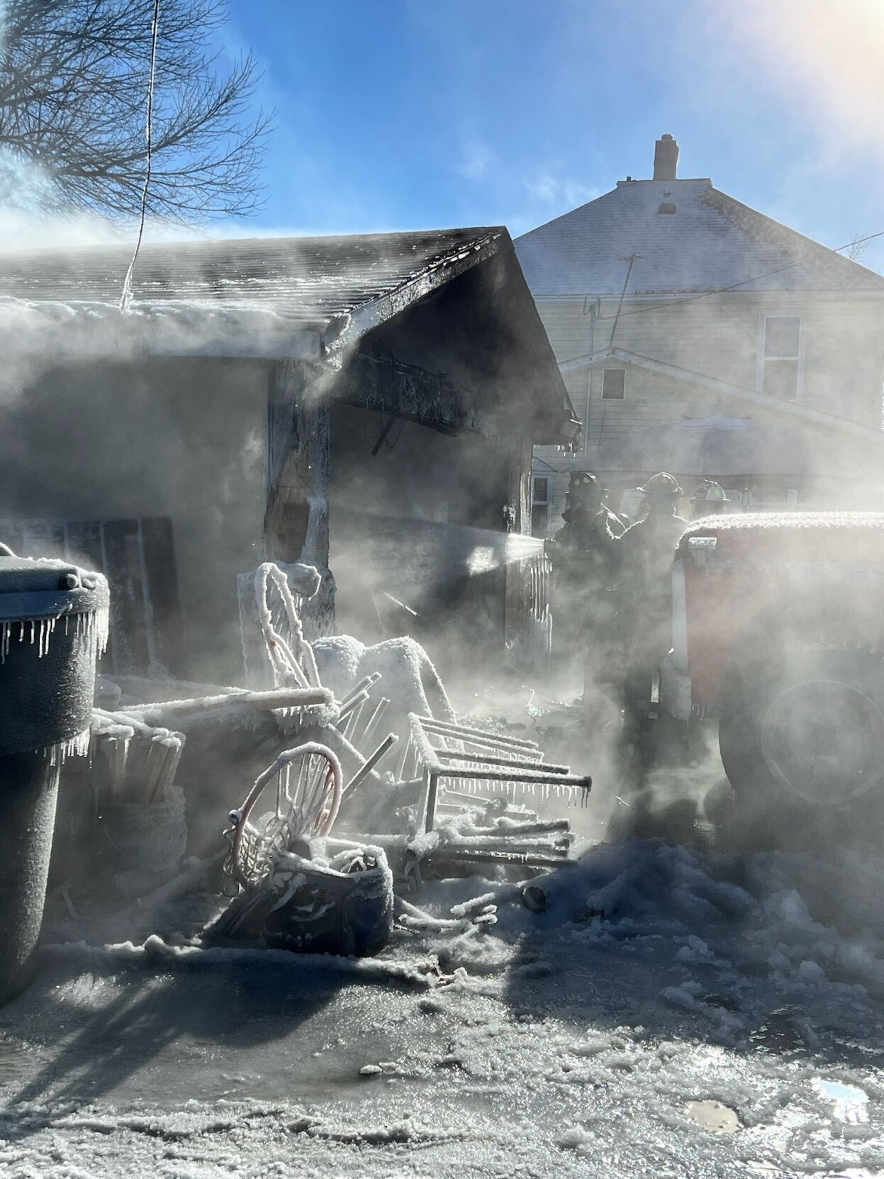 Laurel firefighters extinguish a garage fire in sub-zero temperatures ...