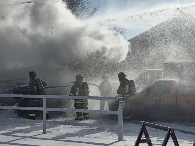 Laurel firefighters extinguish a garage fire in sub-zero temperatures ...
