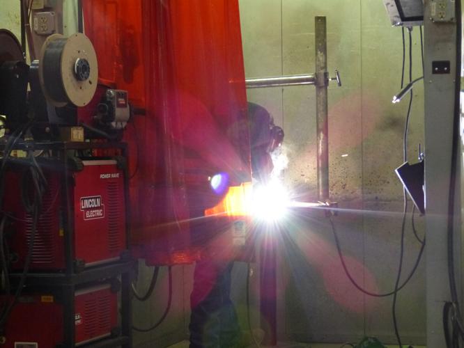Students, professionals get 'Behind the Mask' for an AWS welding ...