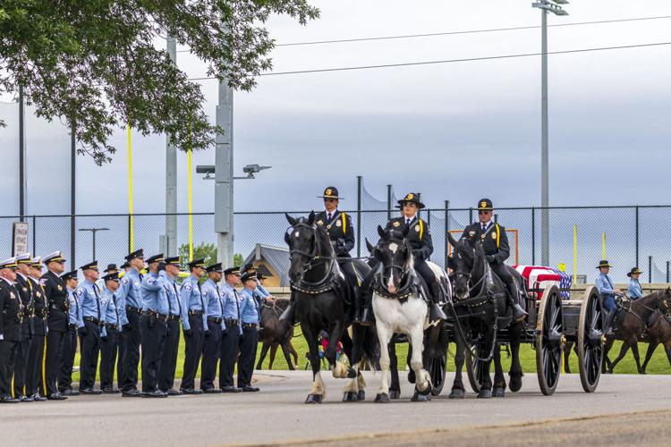 Officer Mitchell remembered as a hero | Police | leadertelegram.com